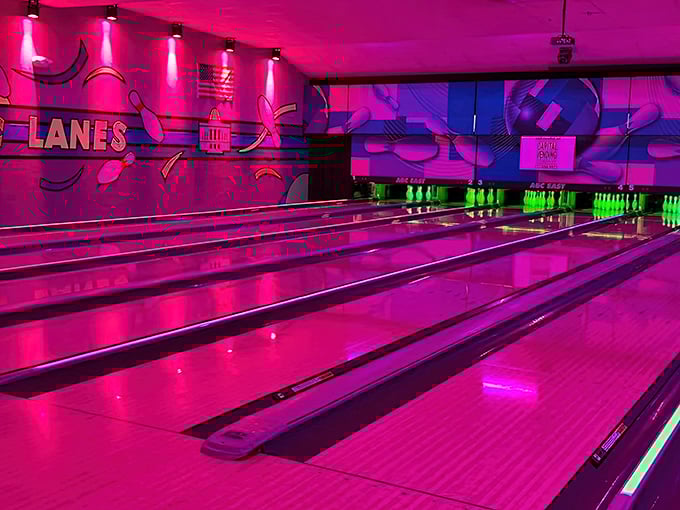 Cosmic bowling transforms ABC East Lanes into a neon dreamscape where the 80s never ended and your bowling skills somehow improve under the glow of hot pink lights.