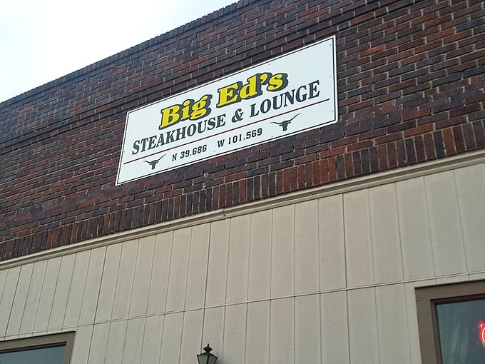 The yellow sign beckons like a prairie lighthouse, guiding hungry travelers to this brick-faced beacon of beef in Bird City.