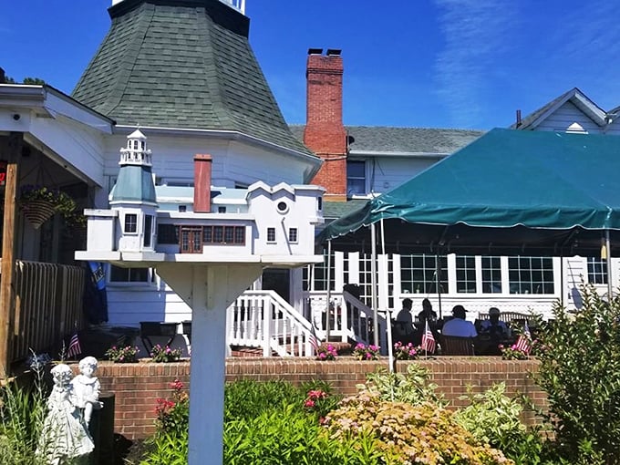 The lighthouse-inspired cupola welcomes diners like a culinary beacon, promising delicious adventures against a backdrop of Maryland's dreamy sunset skies.