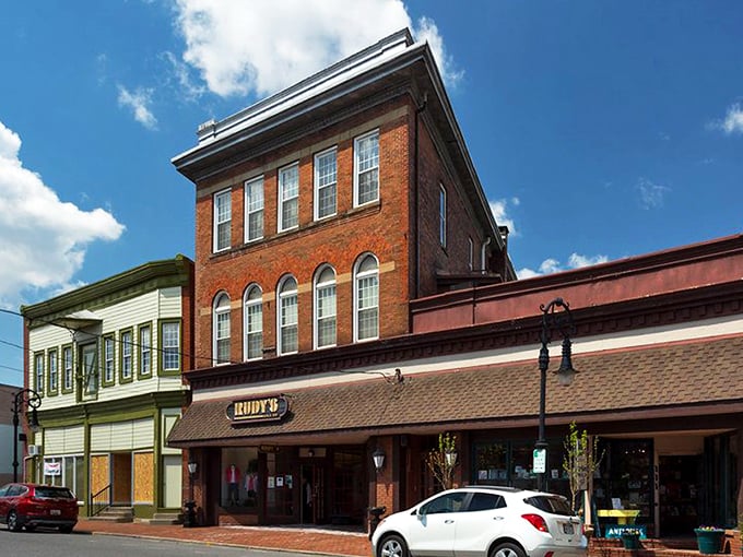 Rudy's storefront stands as a testament to Oakland's preserved charm, where brick buildings and vintage architecture transport you to simpler times.