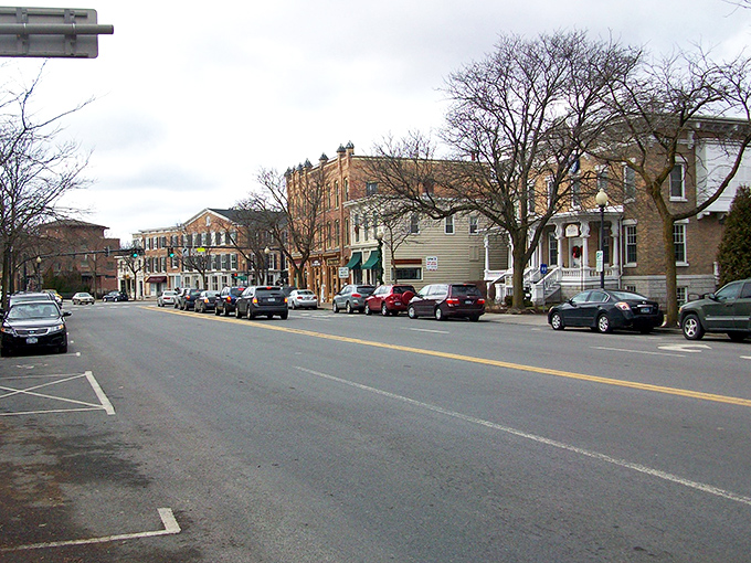 Historic buildings with autumn foliage create that perfect small-town movie set feeling. You half expect Jimmy Stewart to come strolling around the corner.