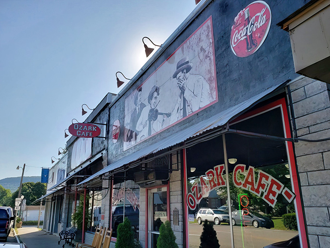 The stone facade of Ozark Cafe stands proudly in Jasper, a time capsule of Americana where breakfast dreams come true since 1909.