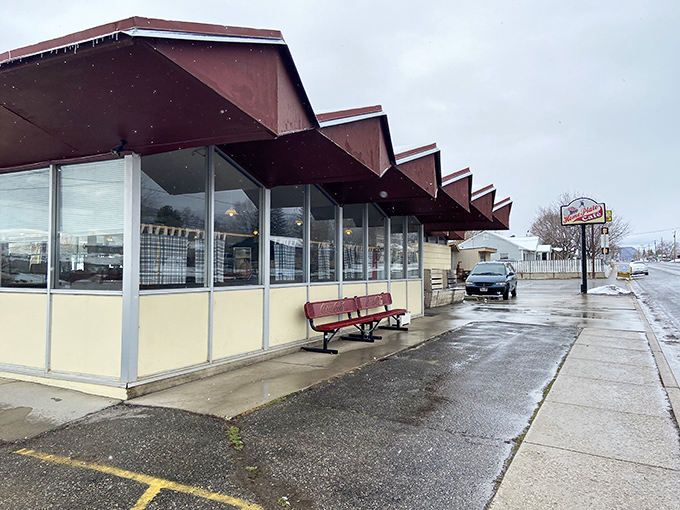 The classic red-trimmed exterior with vintage Coca-Cola bench says everything you need to know&mdash;unpretentious, welcoming, and ready to feed you properly.