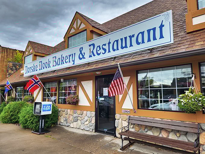 The storybook exterior of Norske Nook beckons like a Norwegian fairytale, complete with stone foundation and flags that say "come hungry, leave happy."