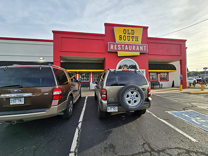 The bright red facade of Old South Restaurant stands like a beacon of comfort food salvation along the highway, promising delicious redemption for hungry travelers.