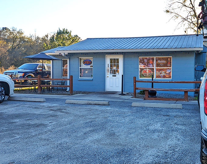 The little blue building that could! Taqueria El Sabor's humble exterior with twinkling lights might not scream "culinary destination," but locals know better.