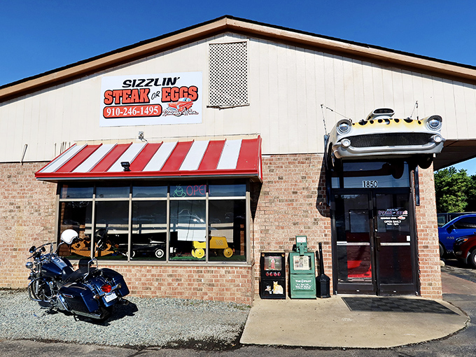 The vintage car bursting from the entrance says it all – this isn't just breakfast, it's a full-throttle Southern Pines experience.