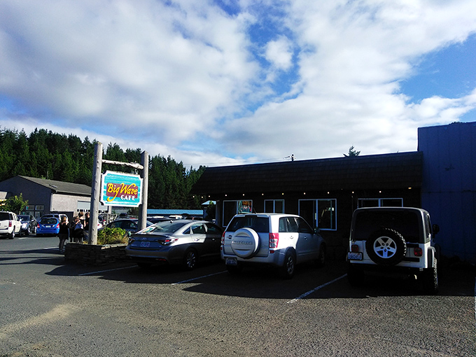 The unassuming exterior of Big Wave Caf&eacute; stands like a coastal secret &ndash; wooden shingles, blue trim, and a simple sign promising oceanic delights within.