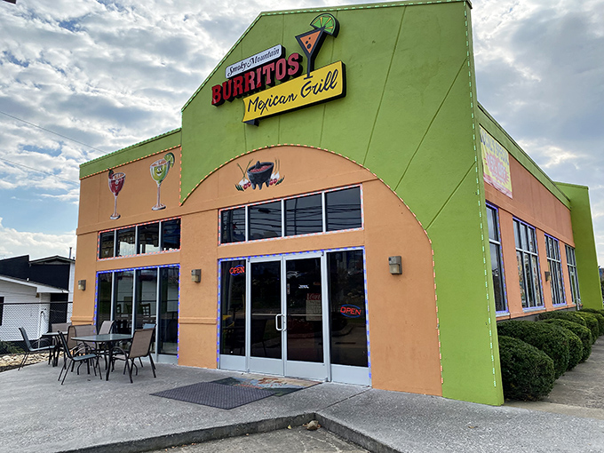 The lime green exterior of Smoky Mountain Burritos stands out like a mariachi band at a library&mdash;bold, unapologetic, and promising a good time.