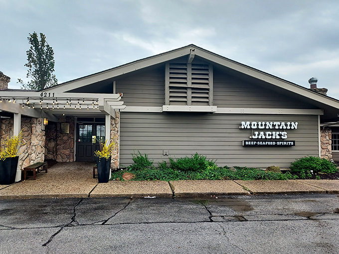 The unassuming exterior of Mountain Jacks hides a carnivore's paradise within. Like finding a treasure chest disguised as a garden shed.