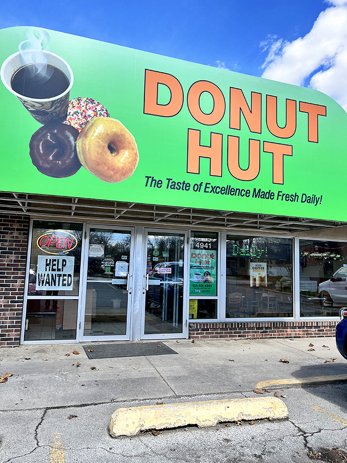 The unmistakable green awning of Donut Hut stands as a beacon of breakfast bliss in Des Moines, promising sweet salvation to early risers and sugar enthusiasts alike.