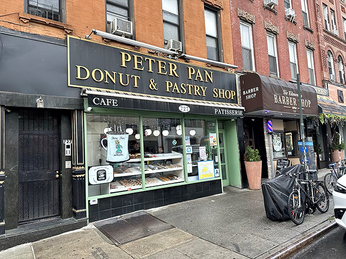 The storefront with gold lettering beckons like a sugar-coated lighthouse on Manhattan Avenue. Donut paradise awaits.