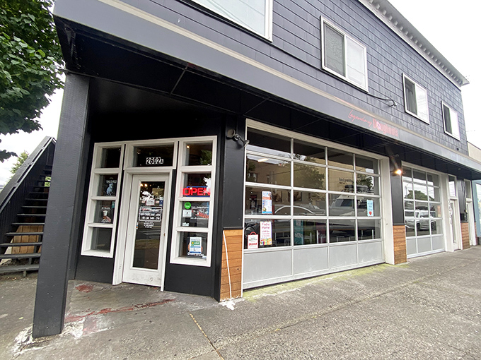 The unassuming blue exterior of Legendary Doughnuts in Tacoma hides a wonderland of fried dough treasures waiting to be discovered.