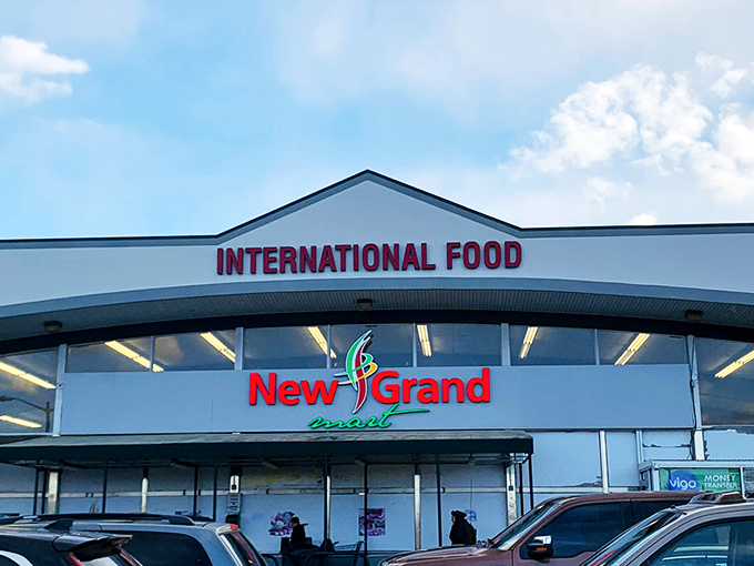 The bright red signage of Panaderia Latina beckons like a beacon of culinary promise. Coffee, cakes, and pastries await behind those unassuming doors.