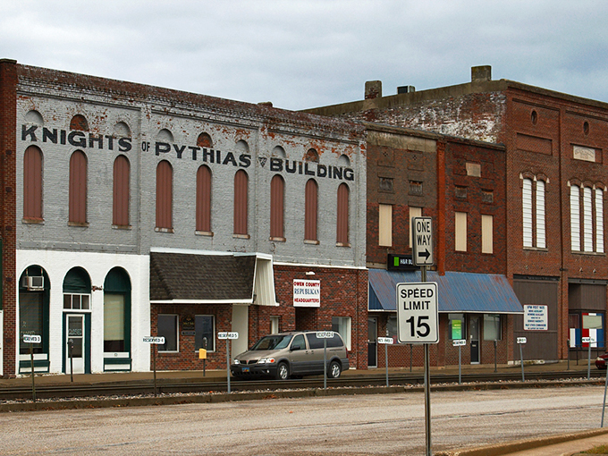 Downtown Spencer's historic storefronts and railroad tracks create that perfect small-town tableau where time seems to slow down just enough to notice life's details.