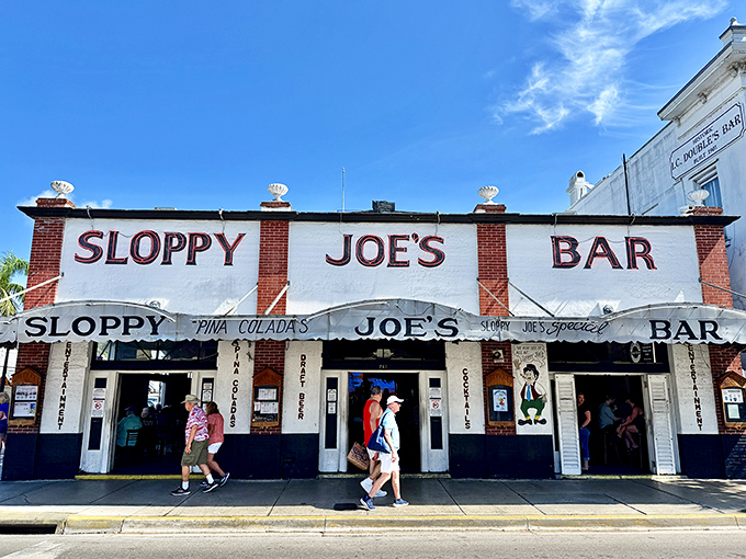 The iconic red and white fa&ccedil;ade of Sloppy Joe's stands proudly on Duval Street, beckoning visitors like a lighthouse for the thirsty sailor.