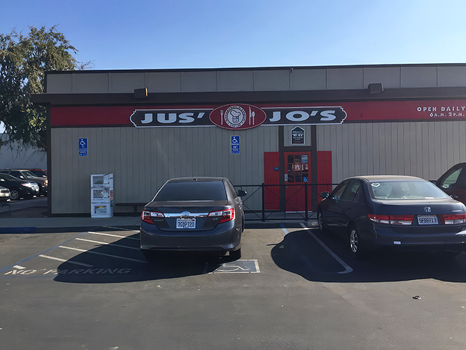 The unassuming exterior of Jus' Jo's Country Kitchen might not stop traffic, but locals know this modest building houses breakfast magic worth the drive.