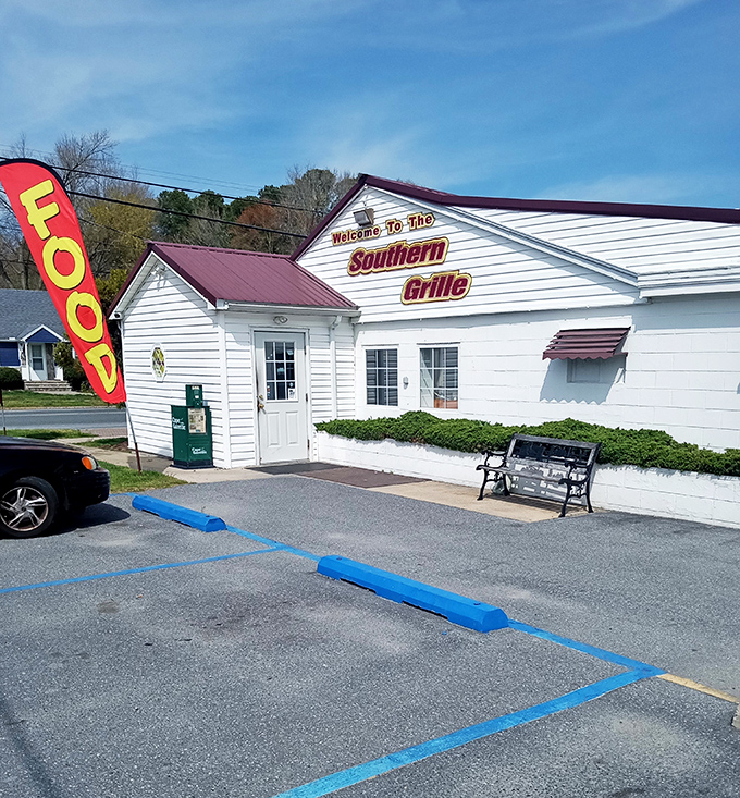 The unassuming white exterior of Southern Grille welcomes you like an old friend who doesn't need fancy clothes to prove their worth.