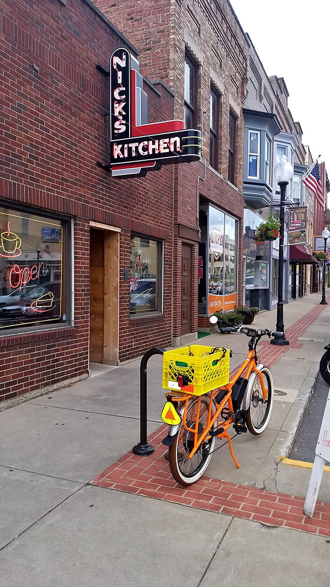 That classic neon sign against brick isn't just advertising – it's a beacon of hope for hungry Hoosiers seeking comfort food salvation.