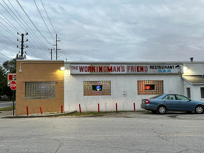 The unassuming exterior of Working Man's Friend stands like a time capsule on Indianapolis's west side, promising honest food without fanfare.
