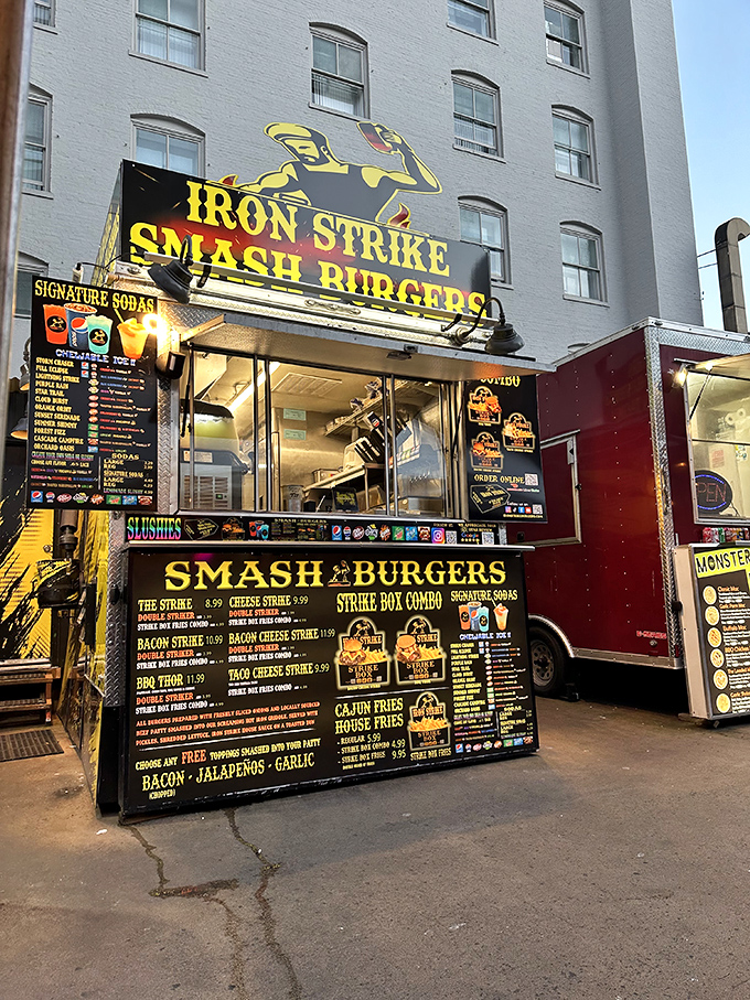 The bright yellow beacon of burger bliss stands proudly among Portland's food carts. Like a culinary lighthouse guiding hungry souls to smash burger paradise.