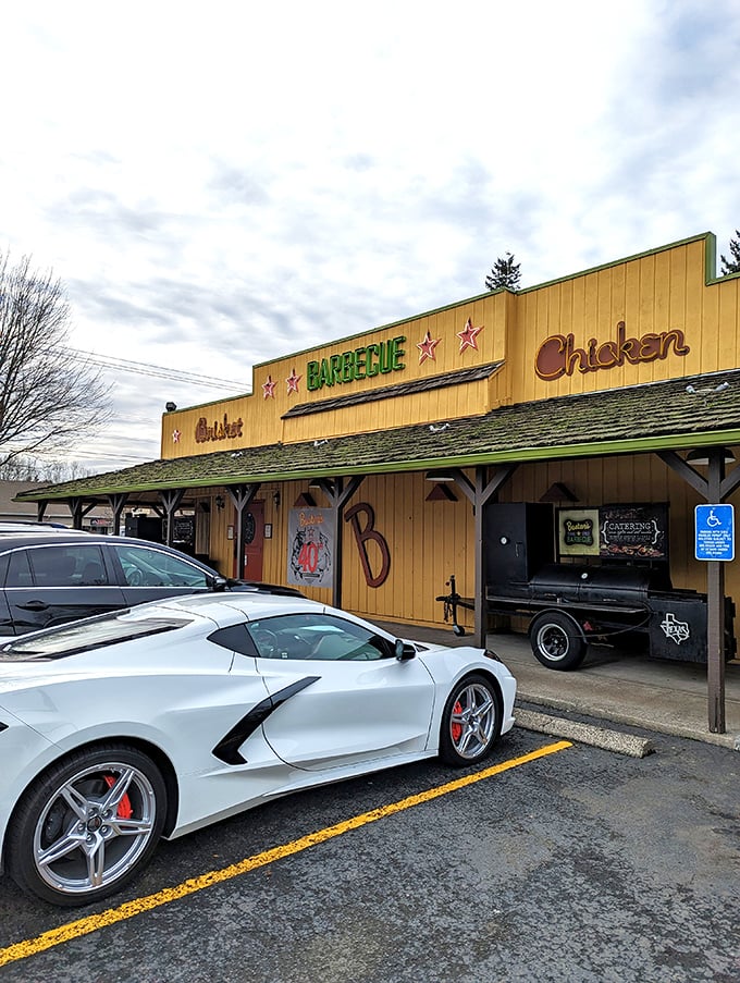 The yellow facade of Buster's stands like a Texas mirage in Oregon, promising smoked meat salvation to weary travelers.