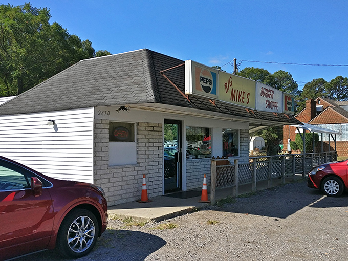 The unassuming exterior of Big Mike's Burger Shoppe stands as a beacon to burger lovers, promising no frills but plenty of thrills inside.