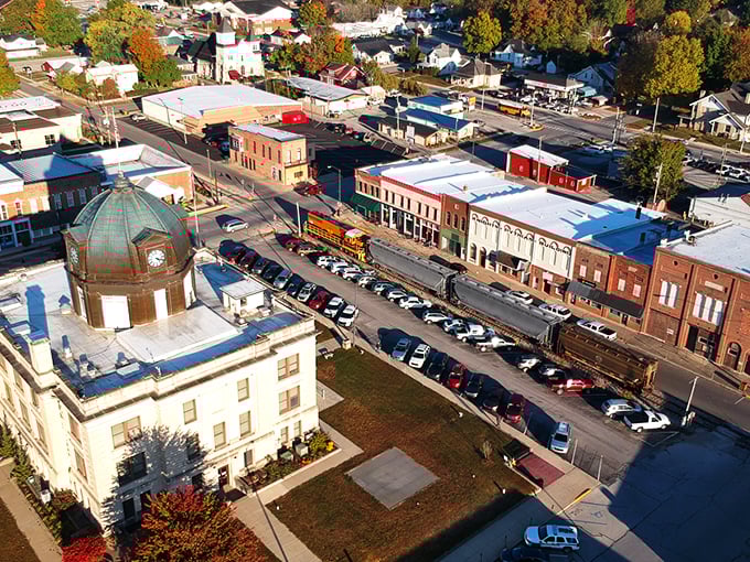 Downtown Spencer's historic storefronts and railroad tracks create that perfect small-town tableau where time seems to slow down just enough to notice life's details.