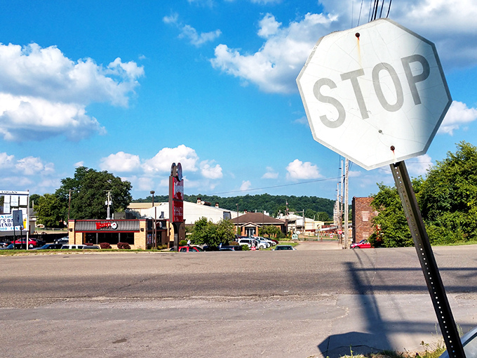 A rainbow graces the hills of Logan, nature's way of saying "stick around, the show's just getting started."