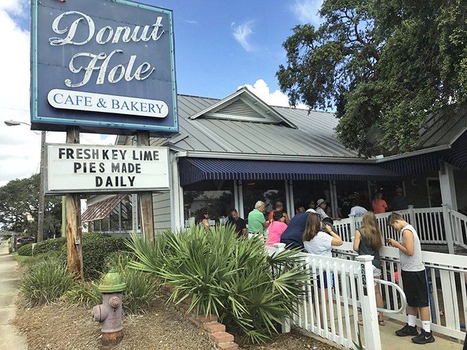 The white picket fence leading to donut paradise isn't just charming&mdash;it's a warning that your diet plans are about to be gloriously derailed.
