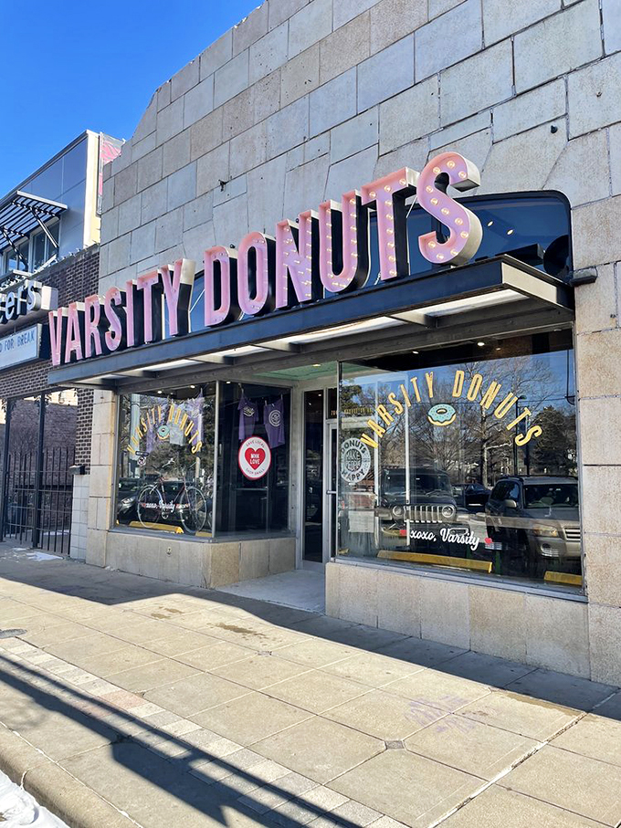 That pink neon sign isn't just announcing donuts&mdash;it's broadcasting joy to Aggieville. Like a beacon of sweetness on Manhattan's Moro Street.