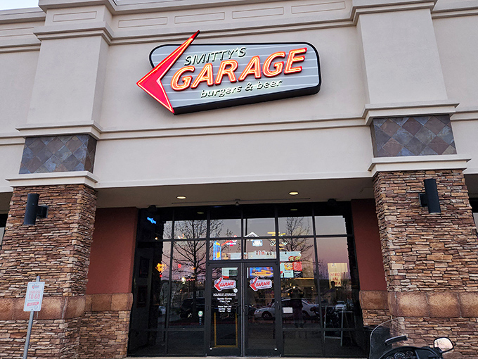 The neon-lit beacon of Smitty's Garage stands proud against the Arkansas sky, promising burger salvation to all who enter.
