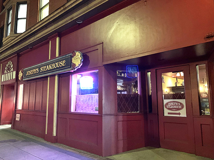 The unassuming brick fa&ccedil;ade of Joseph's Steakhouse hides culinary greatness like Clark Kent's glasses hide Superman. Classic signage promises old-school excellence.