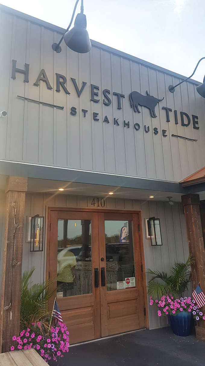The unassuming exterior of Harvest Tide Steakhouse stands like a culinary speakeasy in Lewes&mdash;no neon, no fuss, just the quiet confidence of a place that lets its food do the talking.