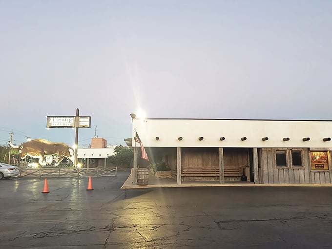 The legendary bull statue stands guard outside Angelo's Steak Pit, a beacon for carnivores that's more reliable than any GPS. "Turn at the giant bull" is local shorthand for "prepare for deliciousness."