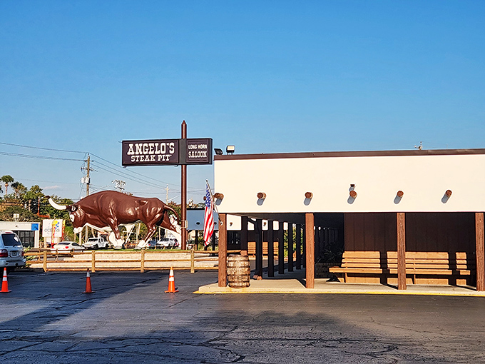 The legendary bull statue stands guard outside Angelo's Steak Pit, a beacon for carnivores that's more reliable than any GPS. "Turn at the giant bull" is local shorthand for "prepare for deliciousness."