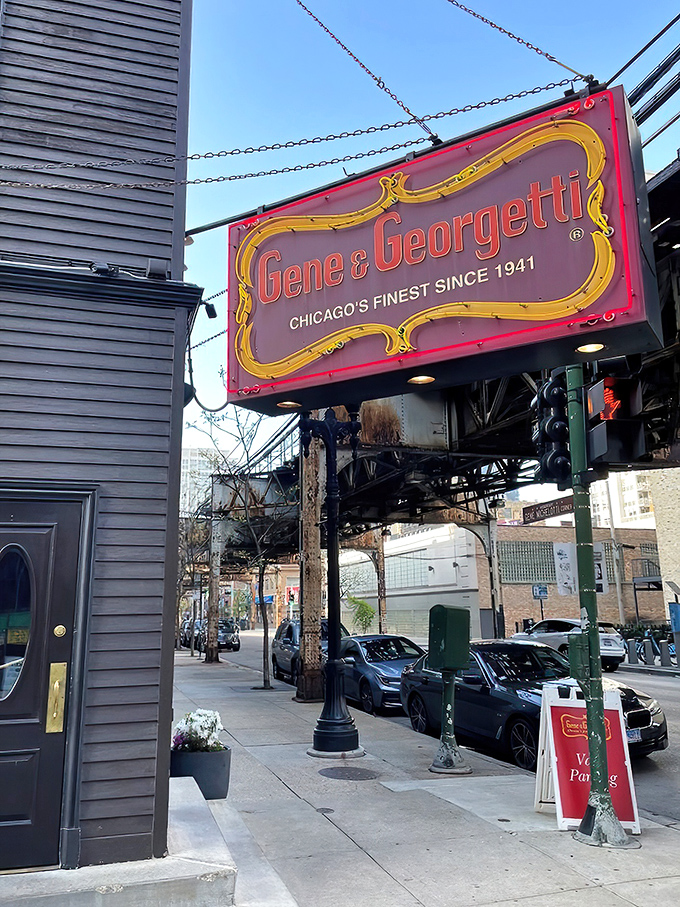 The iconic red and gold sign beckons like a lighthouse for steak lovers. Chicago's culinary history hangs right there on Franklin Street.