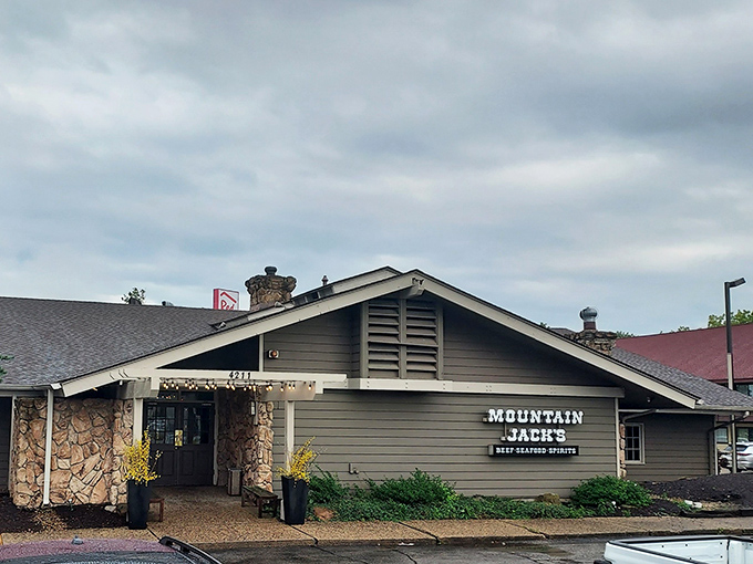 The unassuming exterior of Mountain Jacks hides a carnivore's paradise within. Like finding a treasure chest disguised as a garden shed.