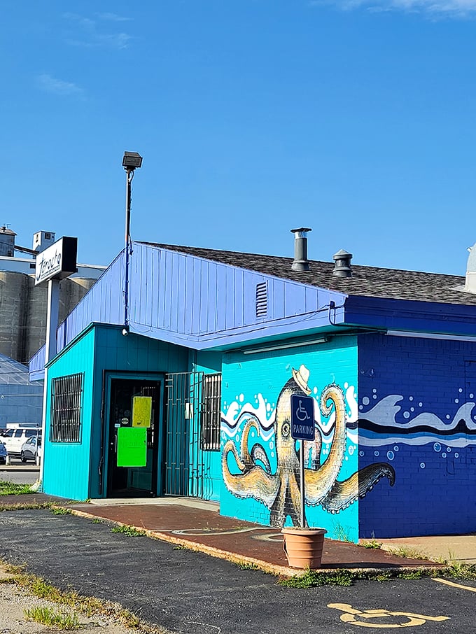 The turquoise building with its playful octopus mural stands like a colorful mirage in Kansas City, promising seafood treasures within.