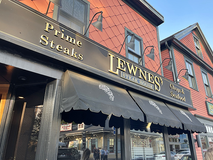 The unassuming exterior of Lewnes' Steakhouse in Annapolis hides a carnivore's paradise within. Classic diamond-patterned shingles and vintage awnings signal you've found the real deal.