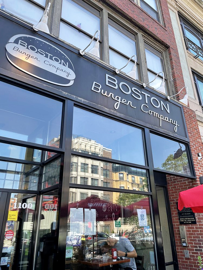 The brick-front gateway to burger paradise, where locals line up for towering creations that require both strategy and napkins. 