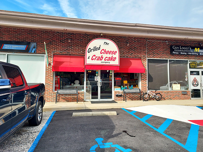 The unassuming storefront with its bright red awning promises comfort food nirvana. Sometimes the best treasures hide in plain sight.
