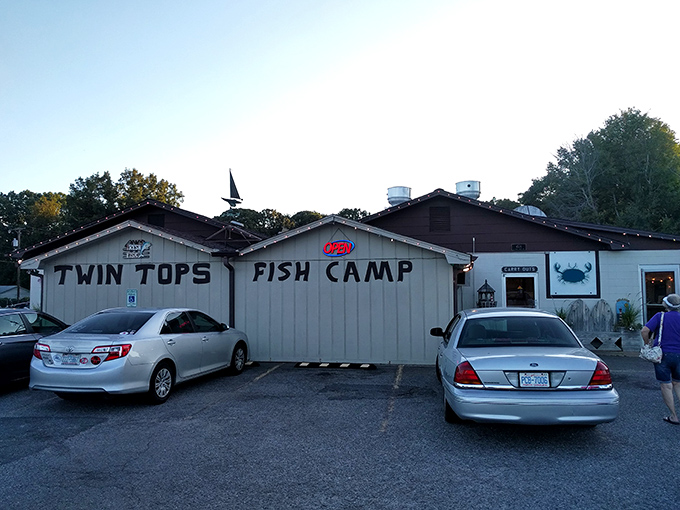 The unassuming exterior of Twin Tops Fish Camp stands as a beacon to seafood lovers. No fancy frills needed when the food inside speaks volumes.