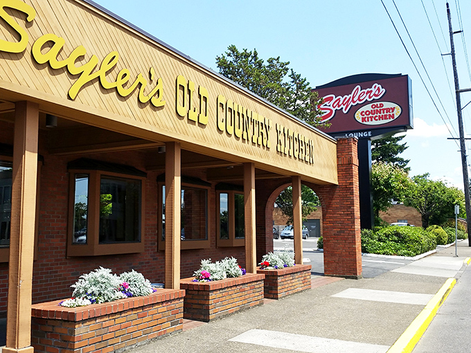 The iconic yellow facade of Sayler's welcomes hungry Oregonians like an old friend who happens to know how to grill a perfect steak. 