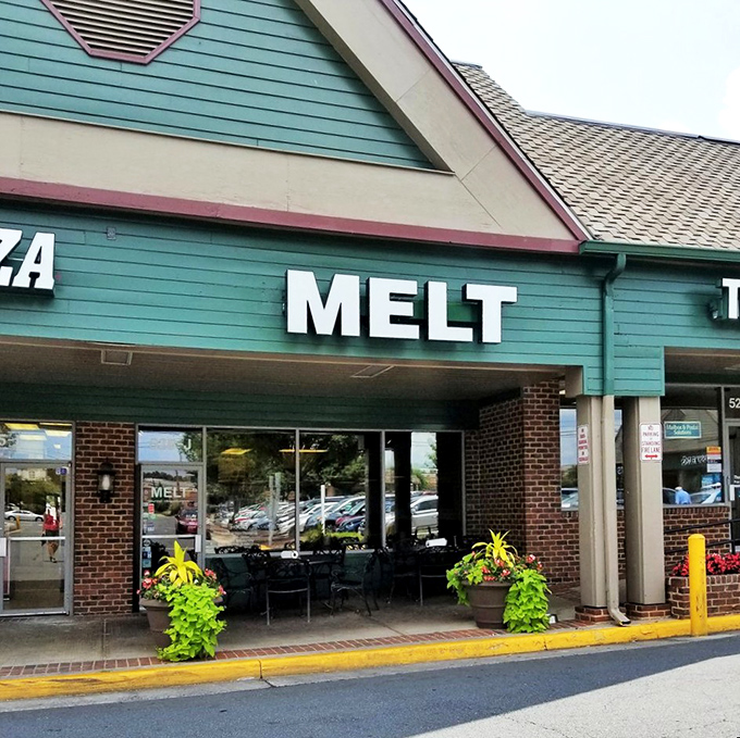 Hiding in plain sight between Papa John's and a UPS Store, this unassuming strip mall treasure proves that culinary greatness doesn't need fancy digs.