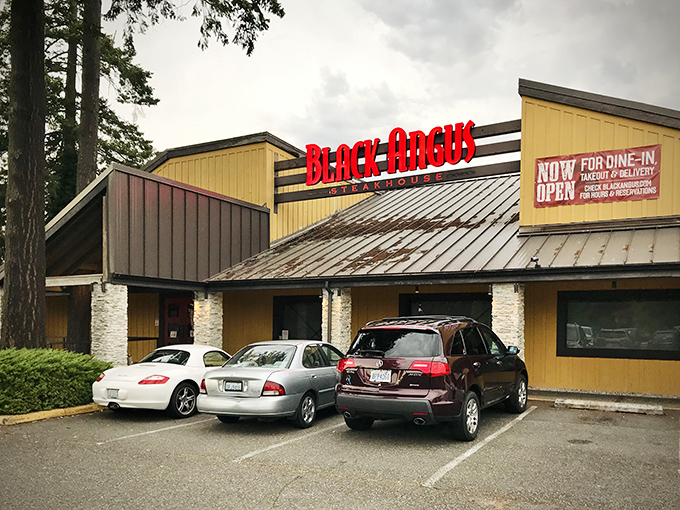 The iconic red sign beckons like a lighthouse for the beef-obsessed, promising respite from trendy small plates and deconstructed disappointments.