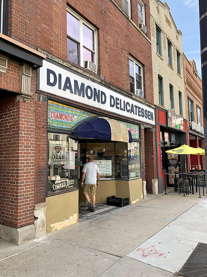 The unassuming storefront of Diamond Deli beckons with its classic brick fa&ccedil;ade and cheerful red umbrellas&mdash;sandwich paradise hiding in plain sight.