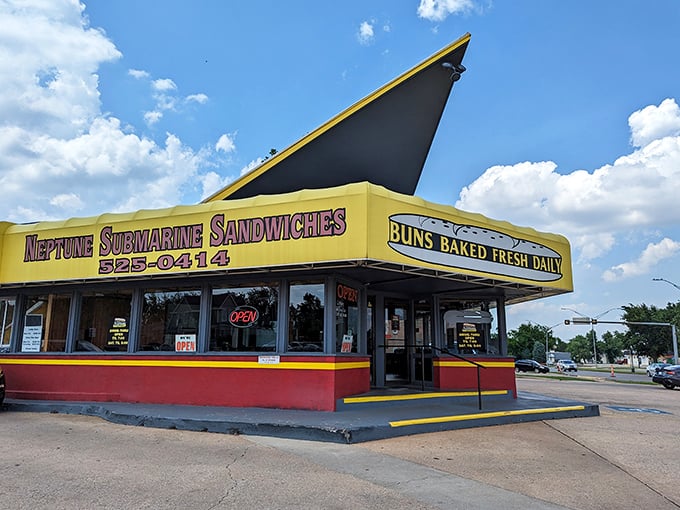 That iconic yellow fin-shaped roof isn't just architectural whimsy&mdash;it's a lighthouse for the sandwich-starved souls of Oklahoma City.