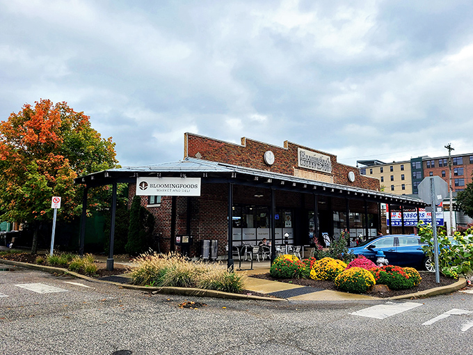 The unassuming brick exterior of Bloomingfoods East hides culinary treasures within, like a delicious secret waiting to be discovered by hungry passersby.