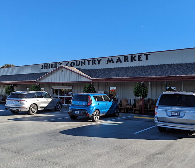 Wooden porch swings beckon hungry travelers outside Shirk's Country Market, where rural charm meets sandwich excellence in Centertown, Missouri. 